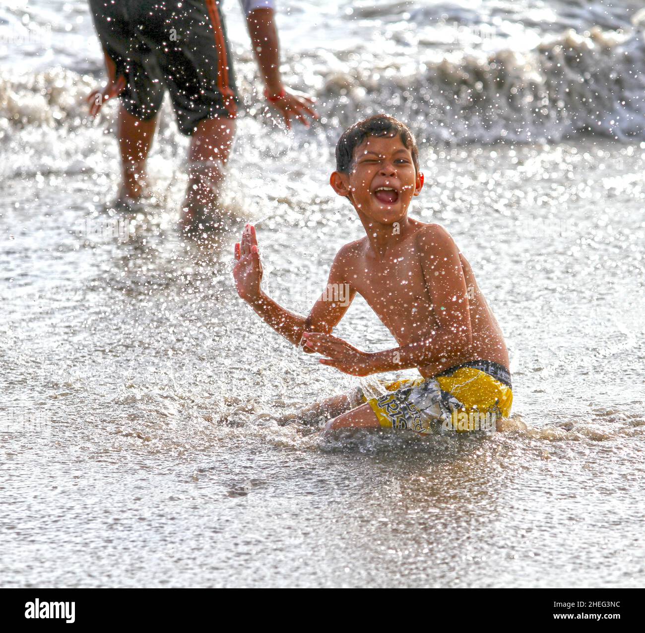 Asian kids playing on a beach hi-res stock photography and images - Alamy