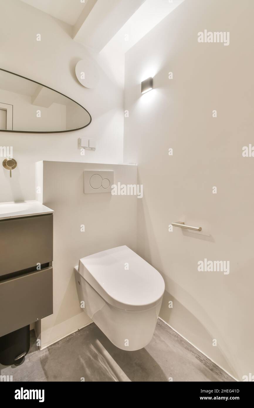 Interior of small clean restroom in miniature style Stock Photo - Alamy