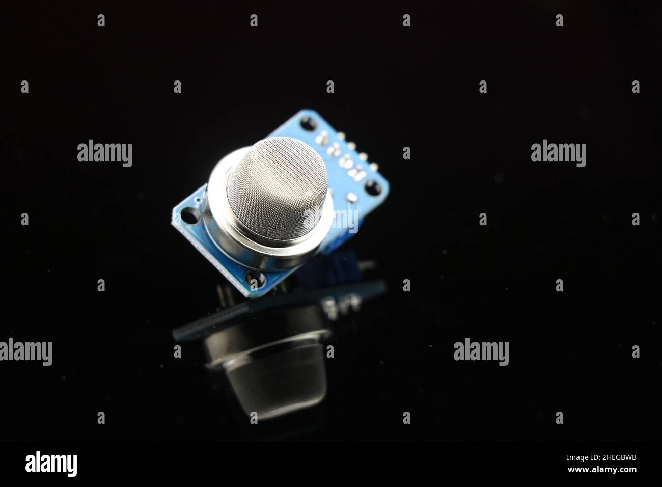 Side view of MQ2 gas sensor module isolated on reflective glass black ...