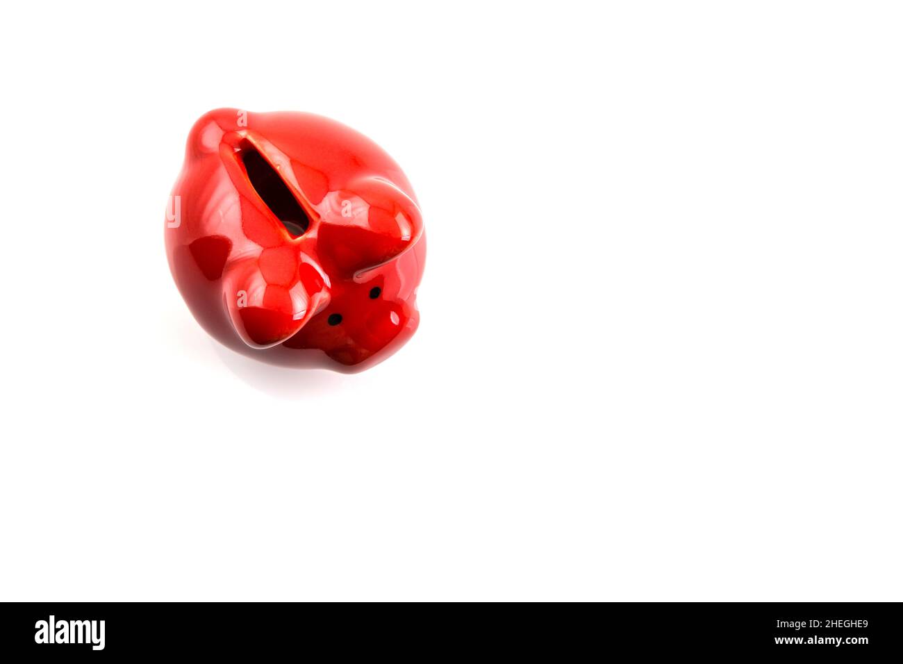 Red Piggy bank isolated on white background Stock Photo - Alamy