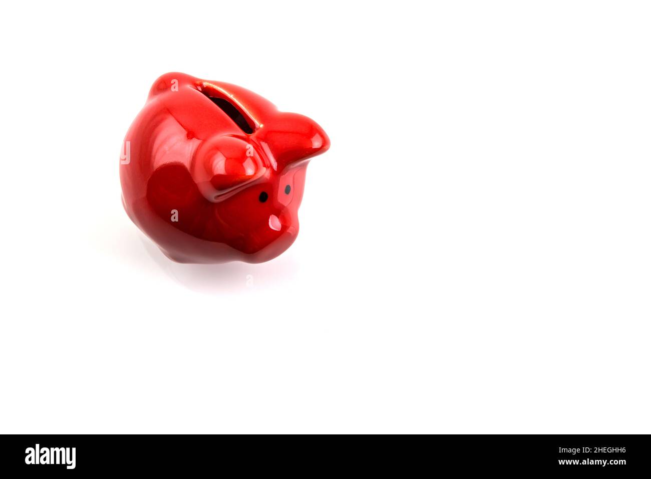 Red Piggy bank isolated on white background Stock Photo - Alamy