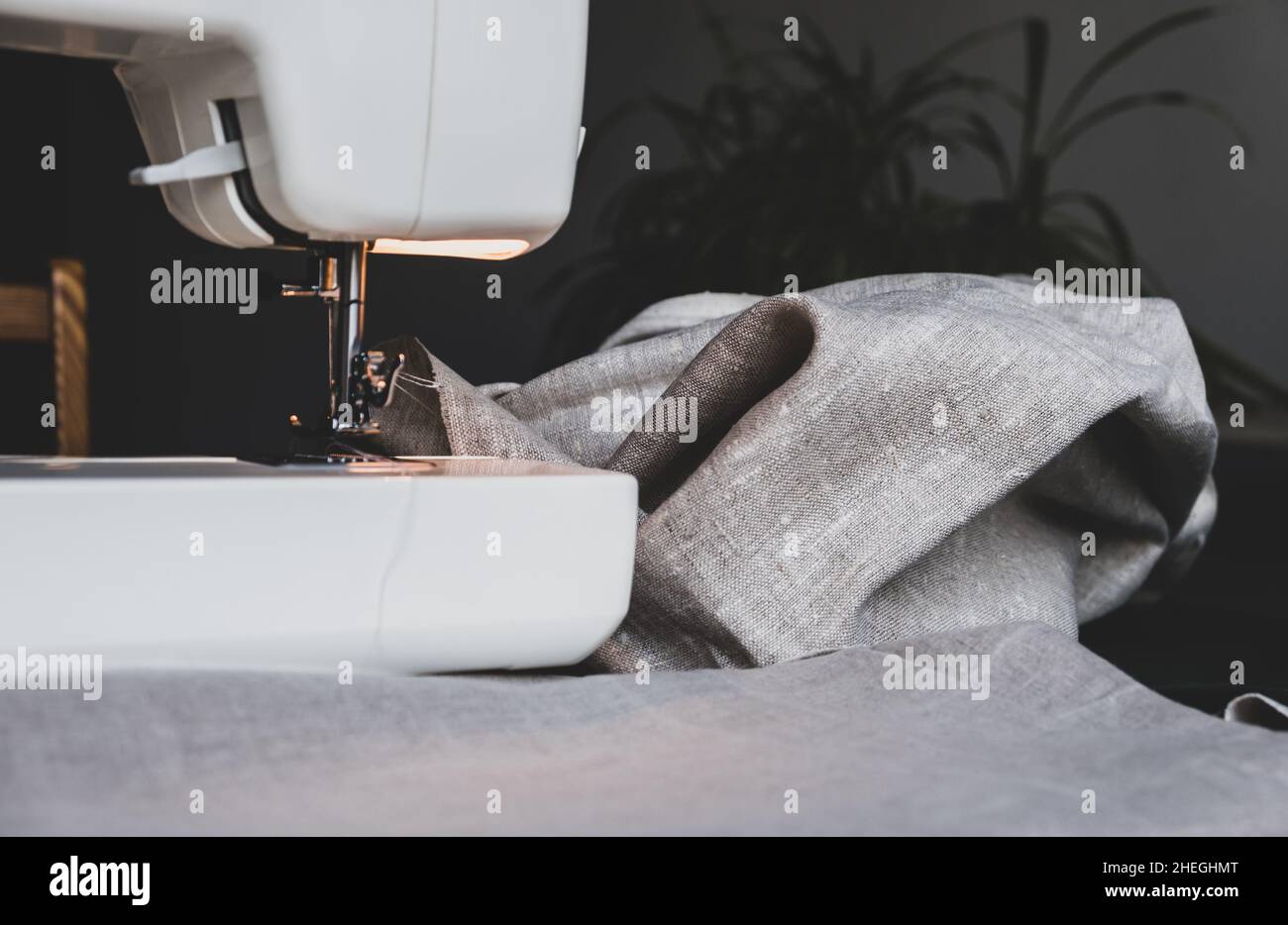 Sewing machine on a table in a sewing workshop, top view. New ...