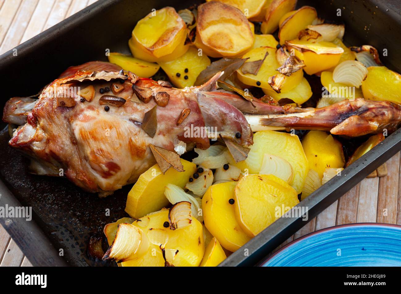 Baked lamb with potatoes in form for cooking, nobody Stock Photo - Alamy