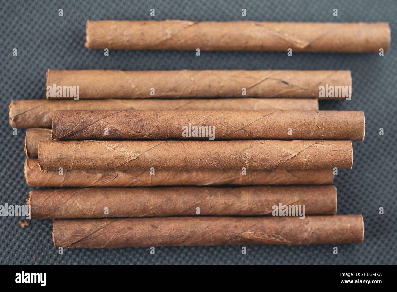 Little aroma cigars, top view. Tobacco smoking concept. Little depth of ...