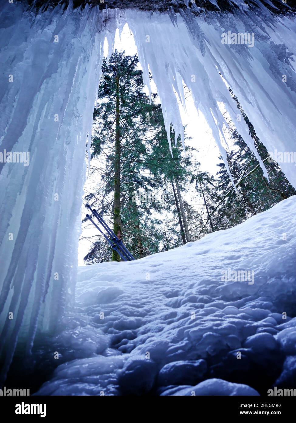 icicles above the frozen river Stock Photo - Alamy