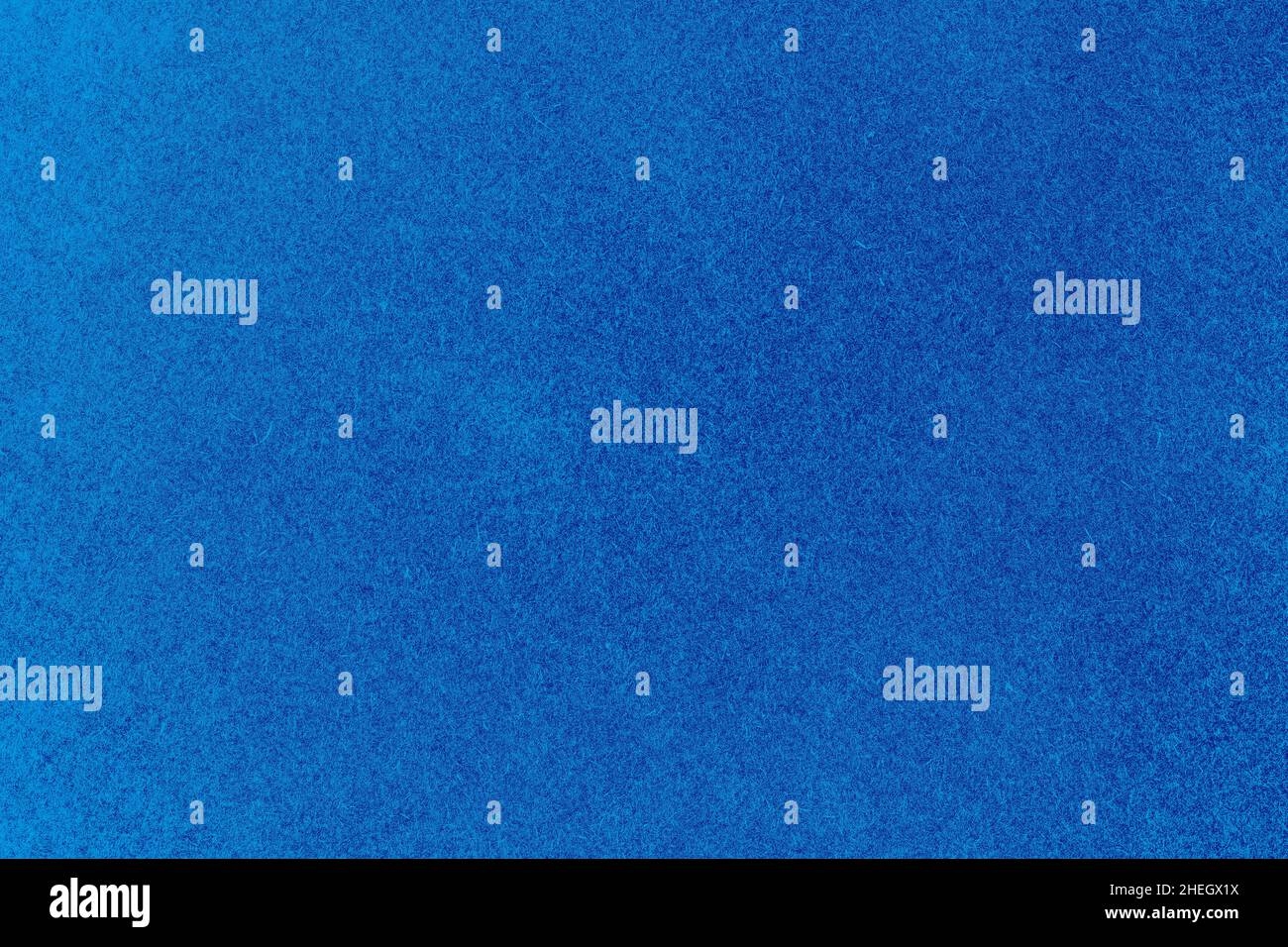Blue color rough stiff paper surface close up view for texture ...