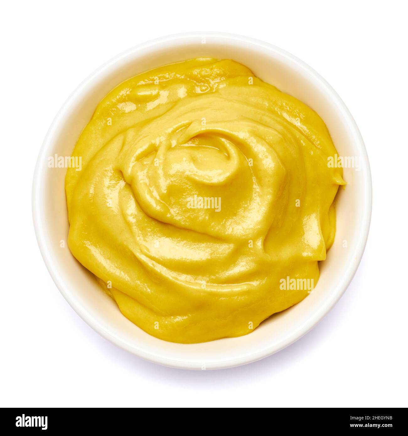 Classic mustard sauce in ceramic bowl isolated on white background ...