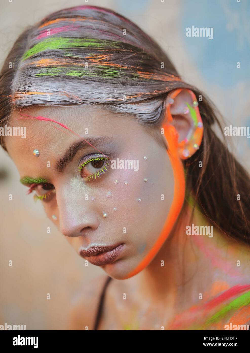 Art makeup. Fashion girl with colorful make up. Beauty woman with ...