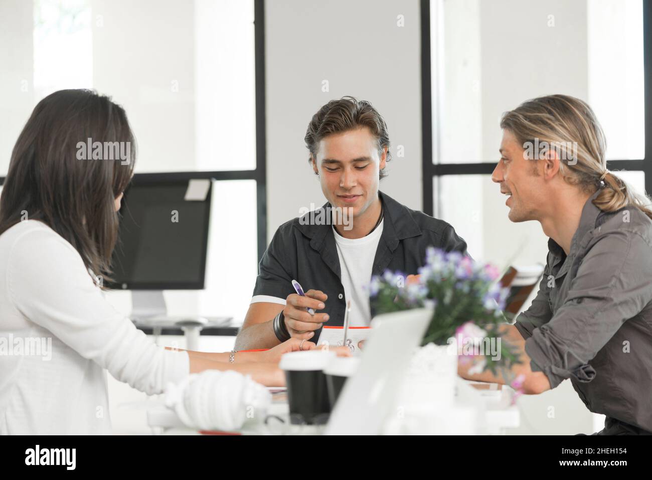 Working in cooperation Stock Photo - Alamy