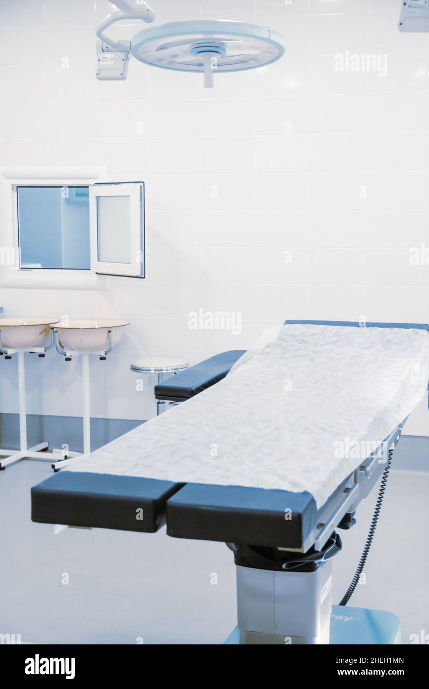 Empty operating room in a hospital. Surgical equipment with operating ...