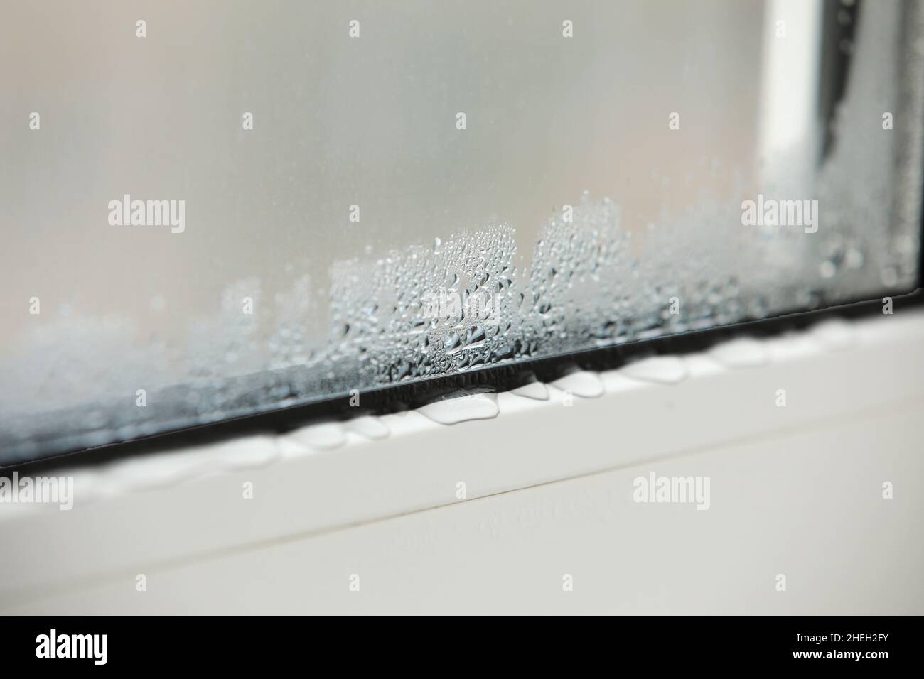 a plastic window with condensation of water on the glass. Double glazed ...