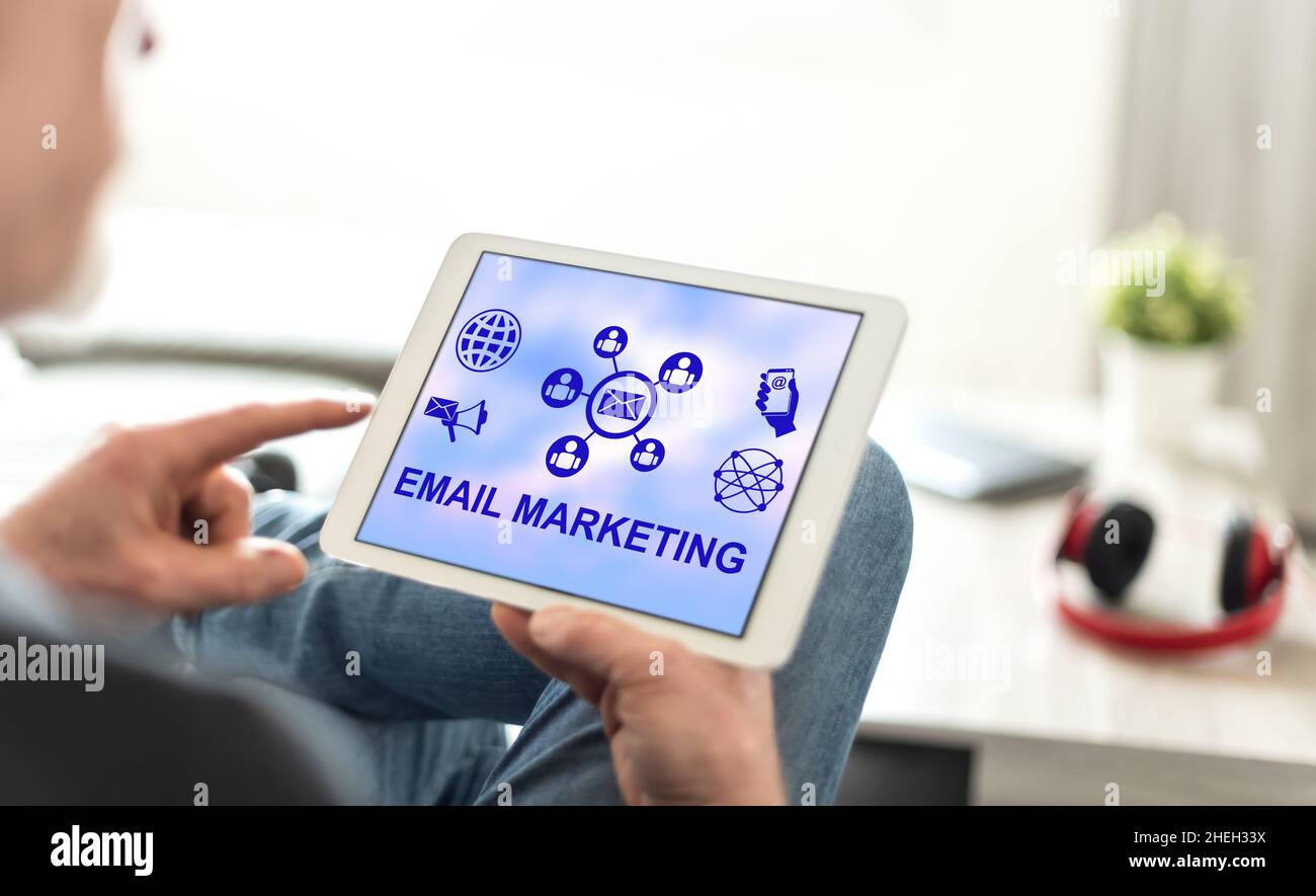 Tablet screen displaying an email marketing concept Stock Photo - Alamy