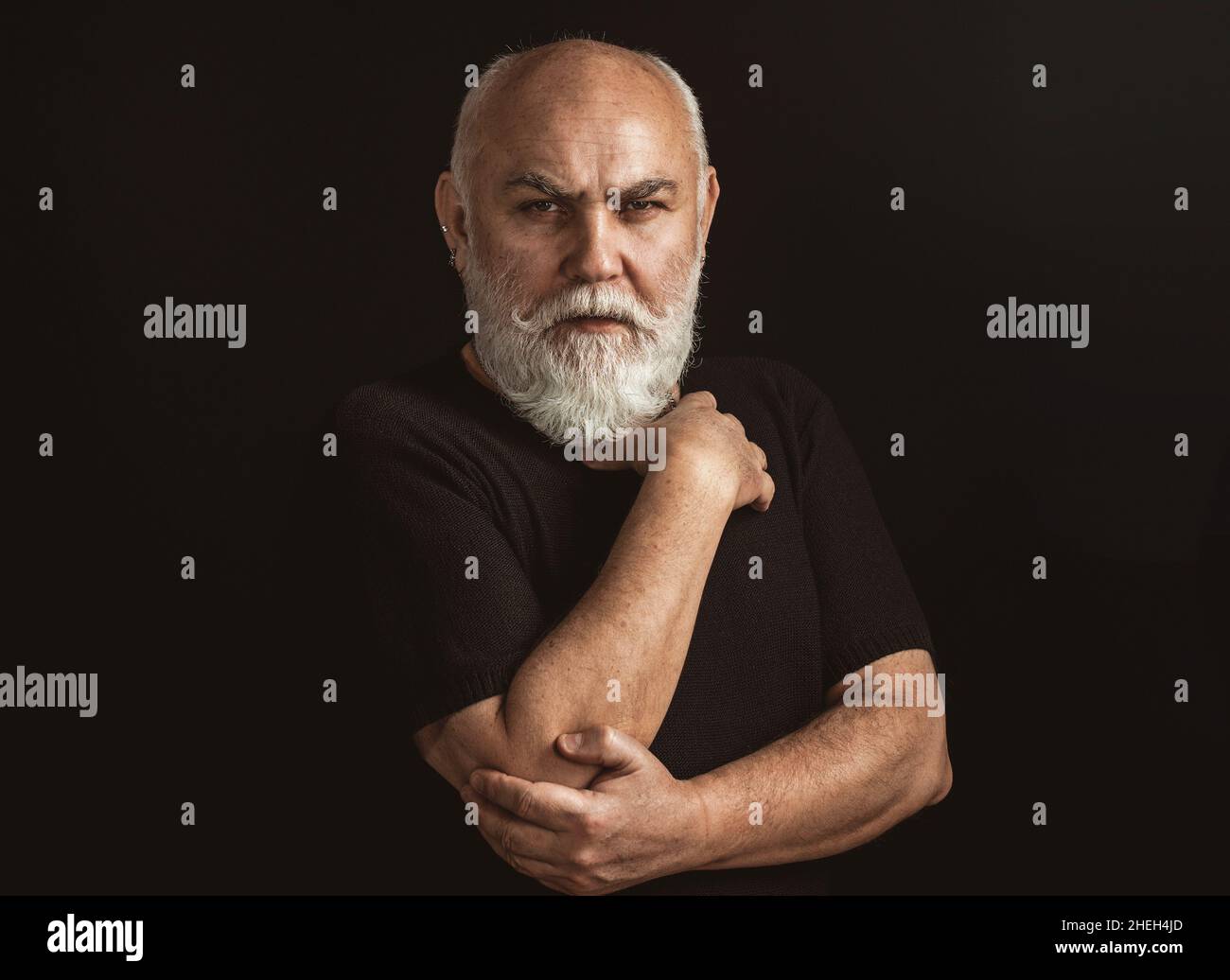 Senior, Golden age. Attractive serious middle aged man Stock Photo - Alamy