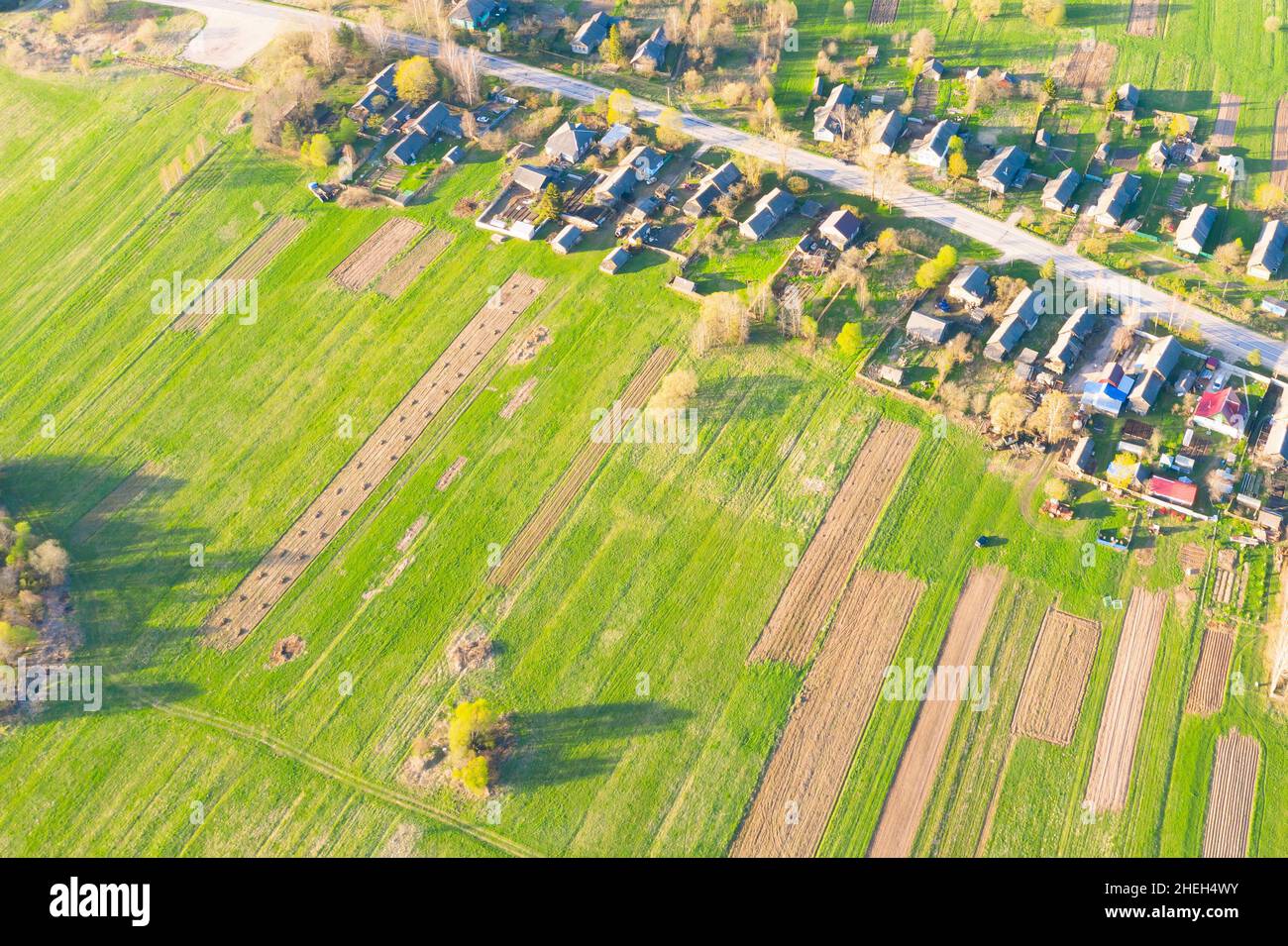 Rural village landscape country with fields and crops Stock Photo - Alamy