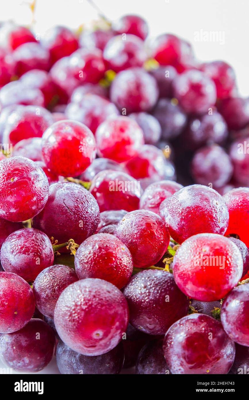 fresh red grape with water drop on white background Stock Photo - Alamy