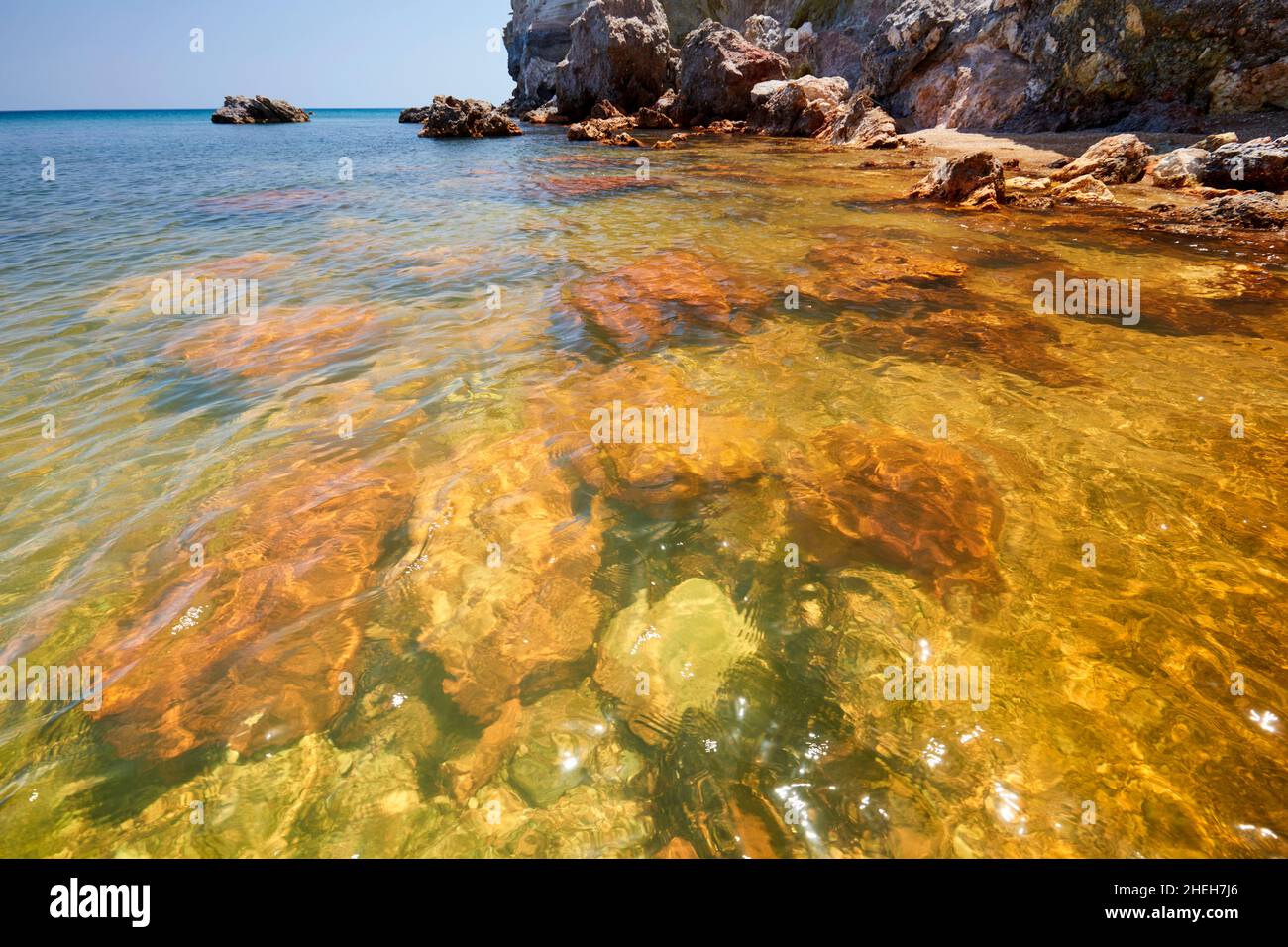 Paleochiro beach with sulfur and other minerals coloured water Stock ...