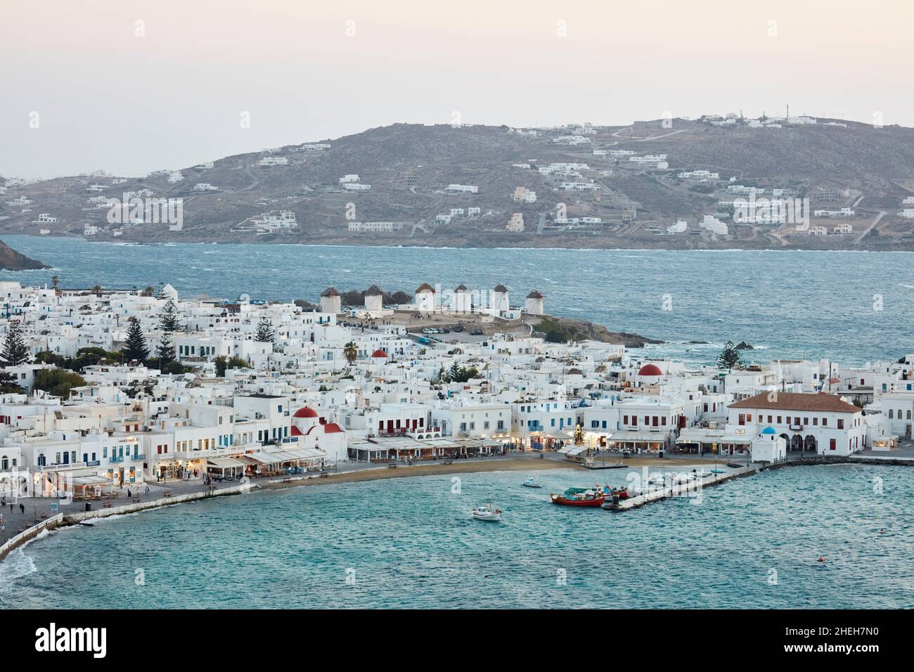 Mykonos city with windmills Stock Photo - Alamy
