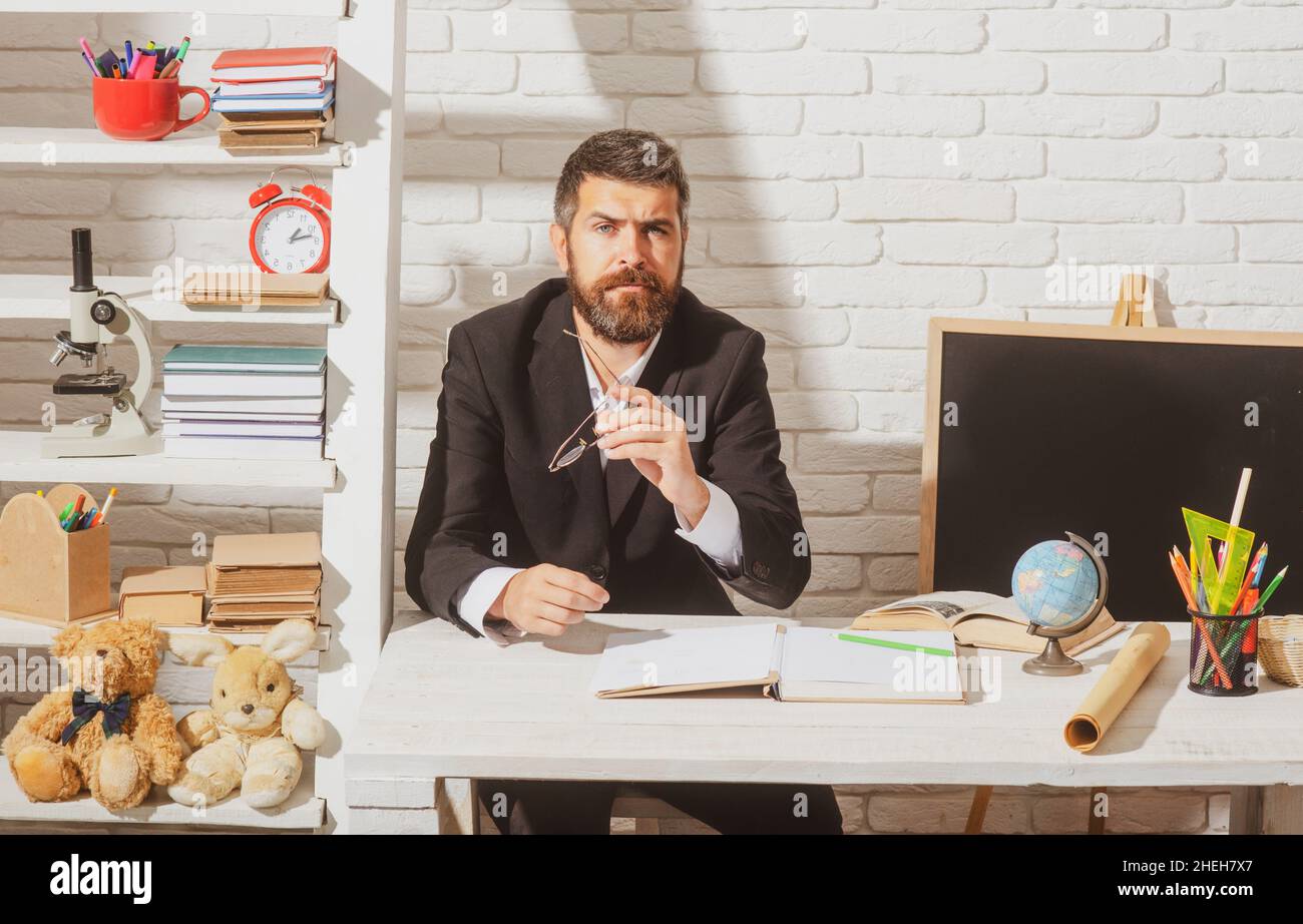 Portrait of teacher from preschool or elementary school in classroom ...