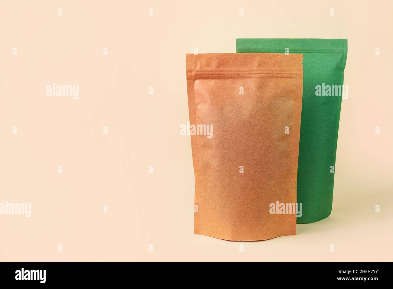 Pouch bags mockup assortment neutral beige background. Merchandise ...