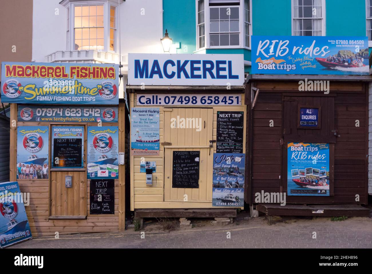 Mackerel fishing boat trip kiosk at harbourside, Tenby, Pembrokeshire ...