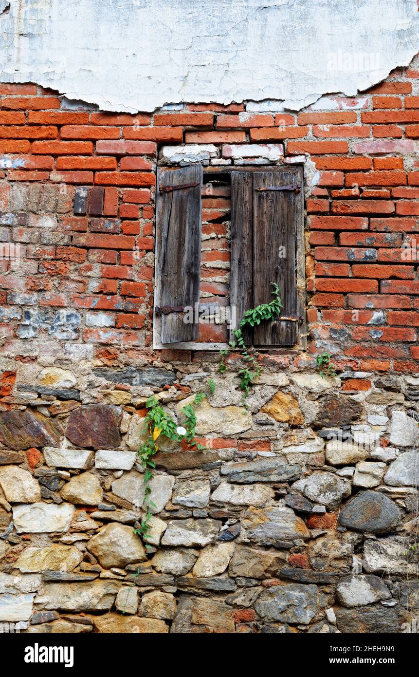 Walled up window in old brick wall with wooden shutters Stock Photo - Alamy