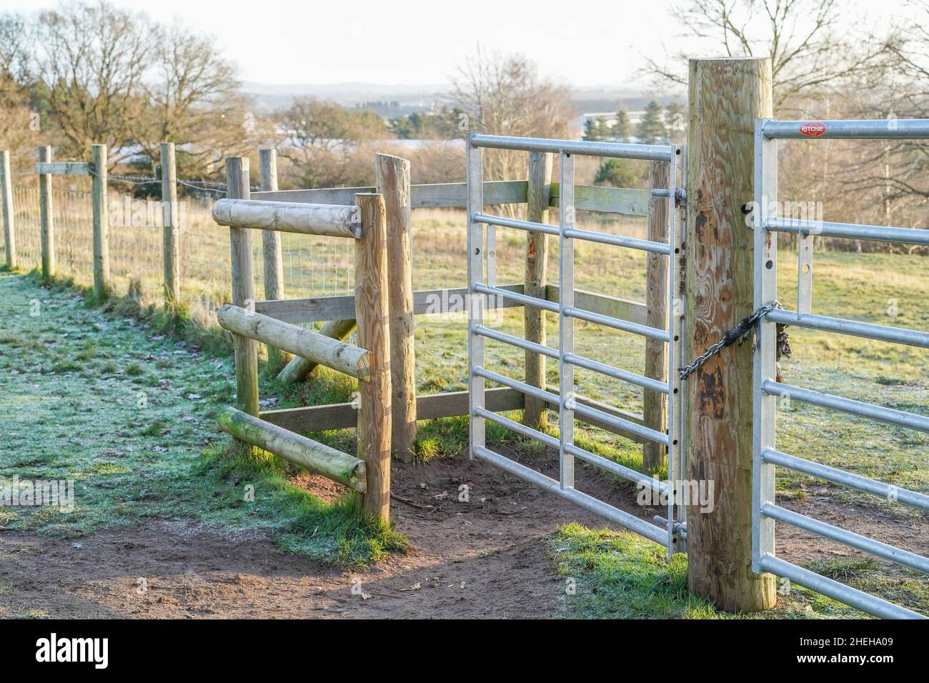 Metal kissing gate in UK countryside on a frosty, winter morning Stock ...