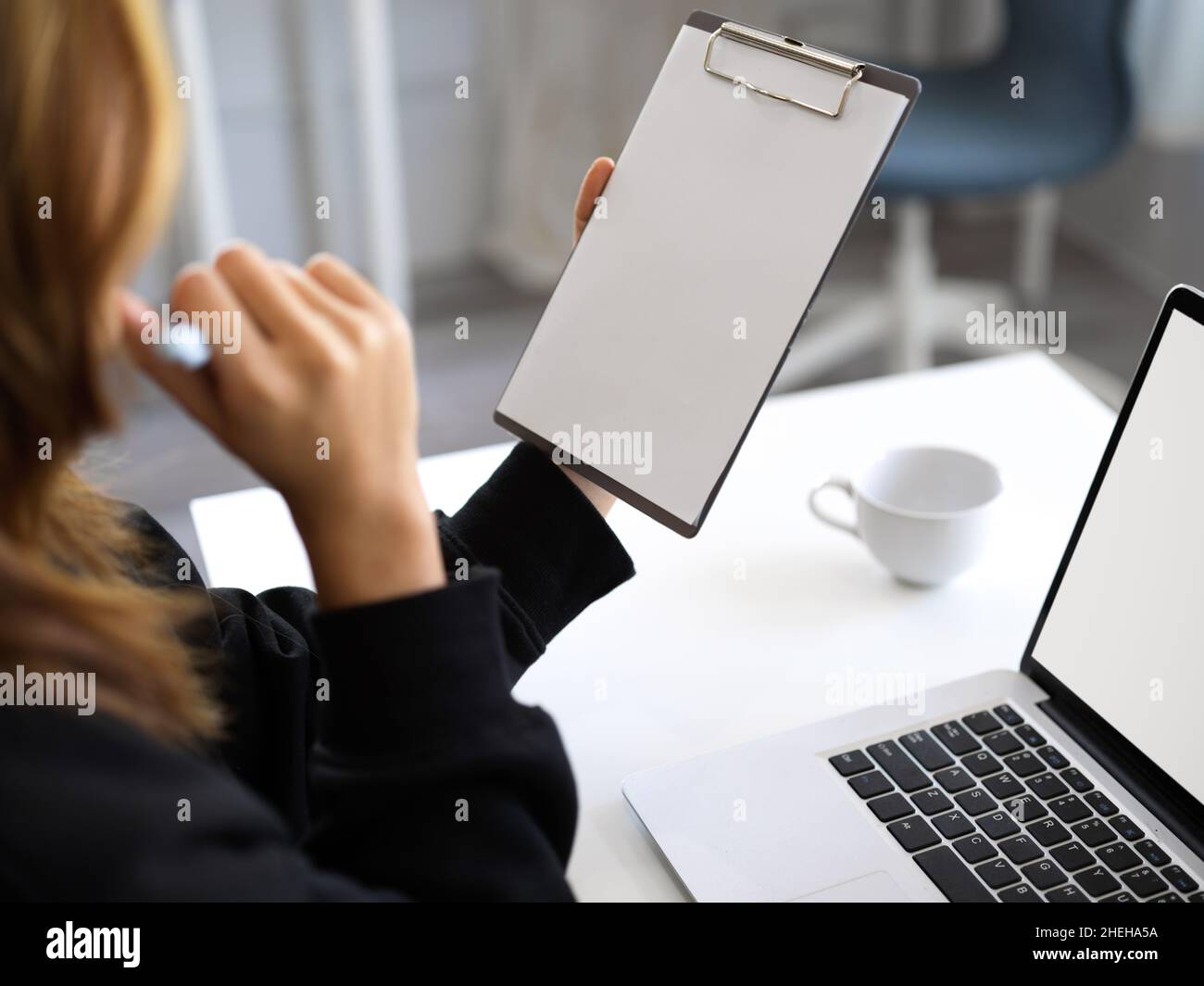Female officer clipboard hi-res stock photography and images - Alamy