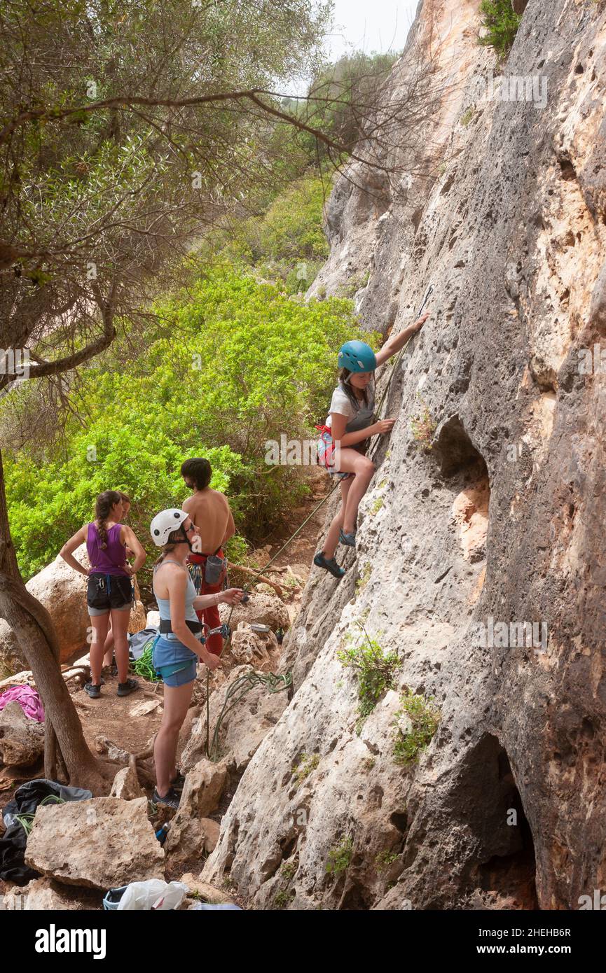 People rock climbing at Cala Magraner, Mallorca, Spain Stock Photo - Alamy