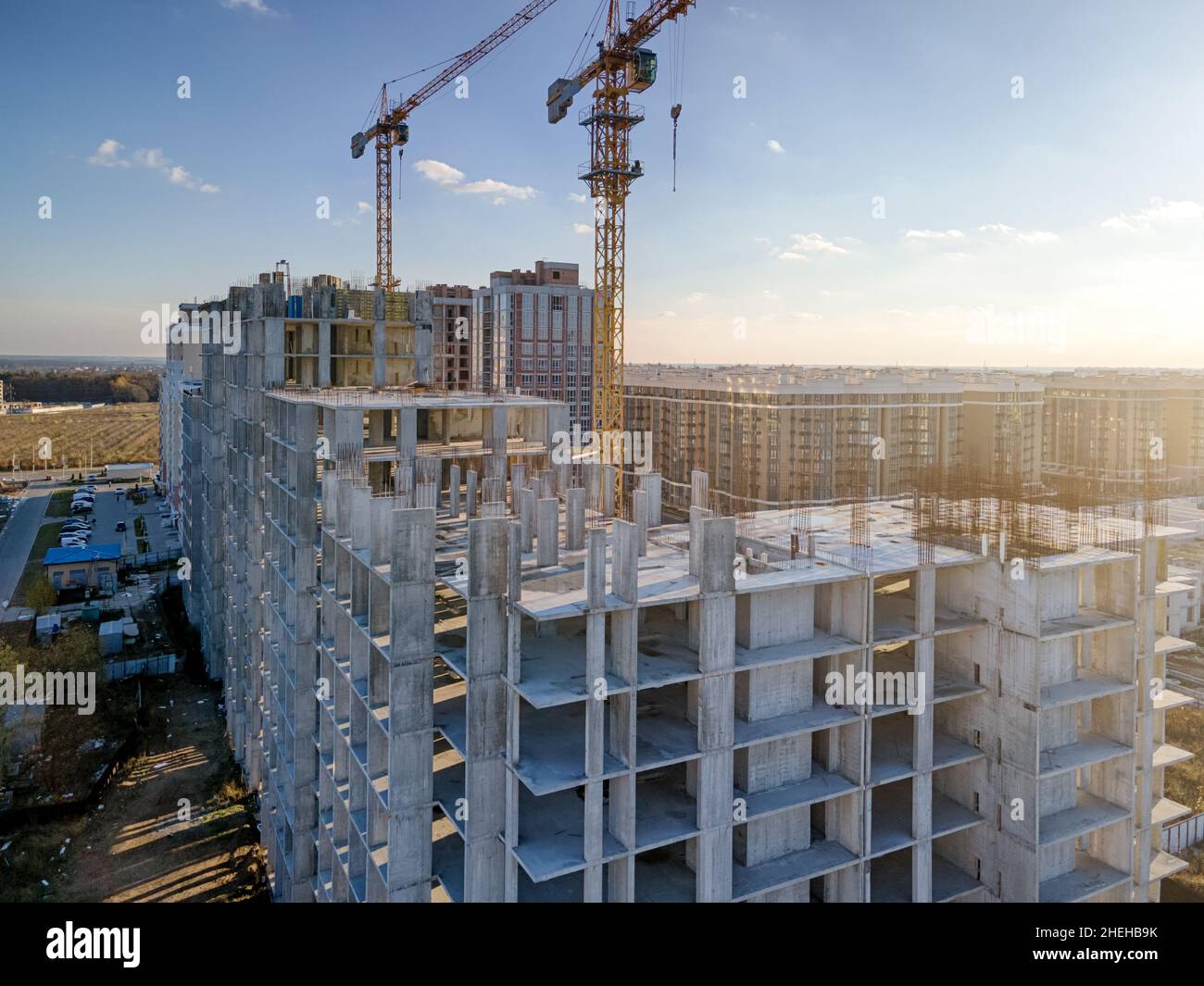 New residential building under construction. Beautiful evening light ...