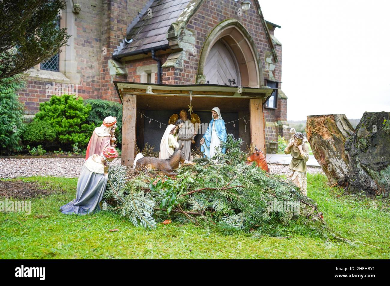 Christian nativity scene on display outdoors in the churchyard of a ...