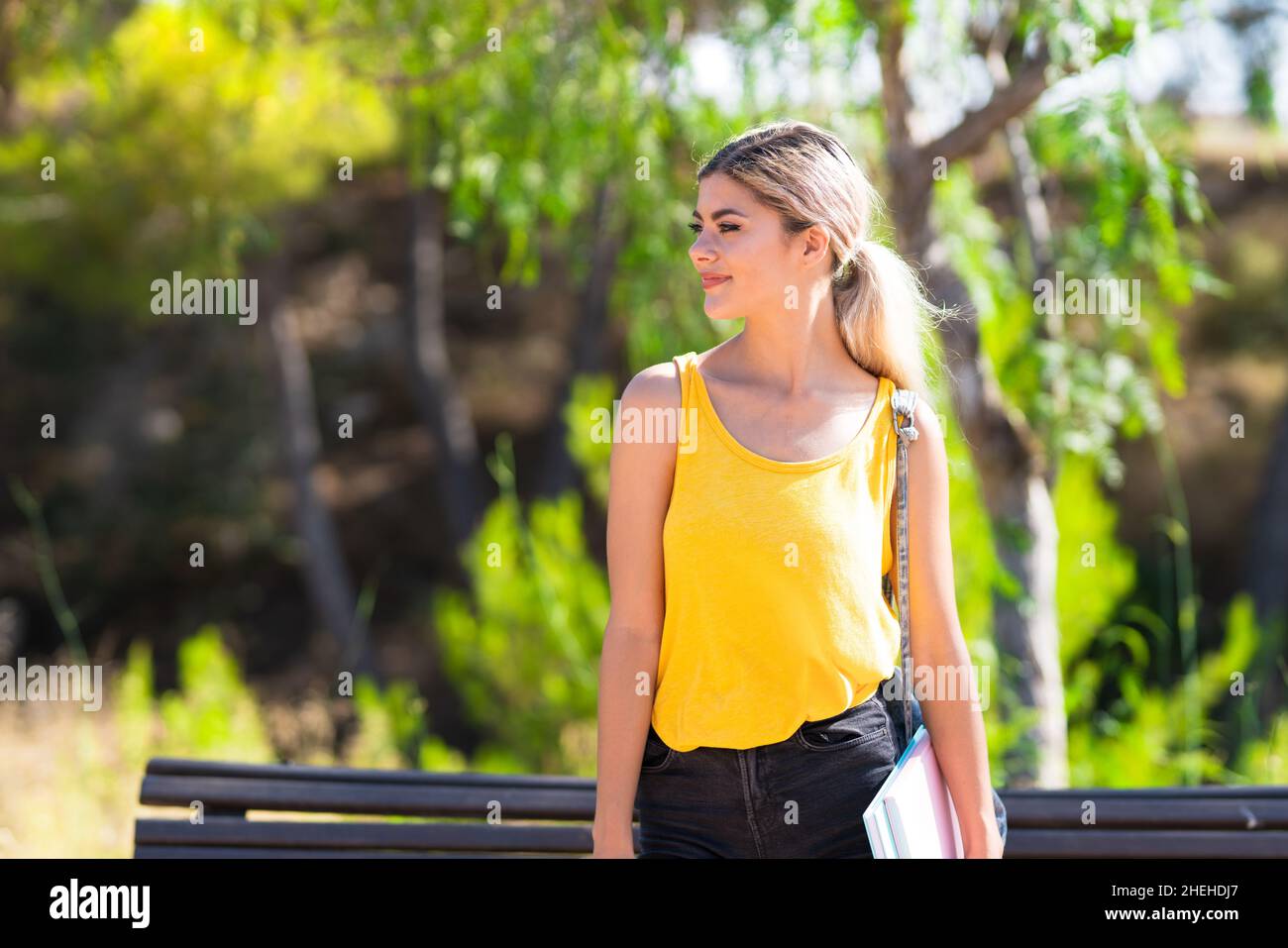 Young teenager student girl at outdoors Stock Photo - Alamy