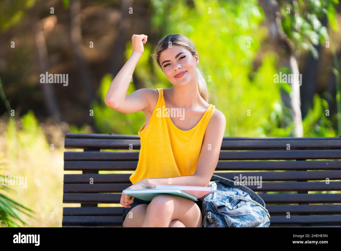 Teenager student girl at outdoors celebrating a victory Stock Photo - Alamy