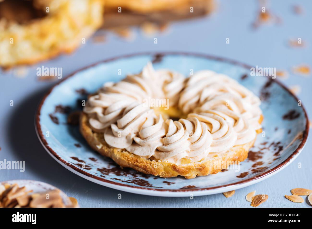 Traditional french Dessert called Paris Brest on a grey background with ...