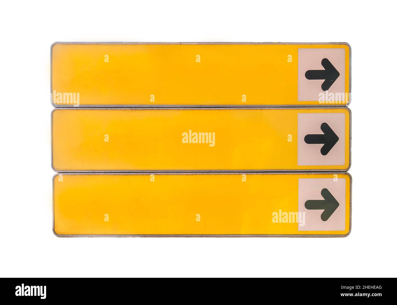 Yellow directional arrow road sign Stock Photo - Alamy