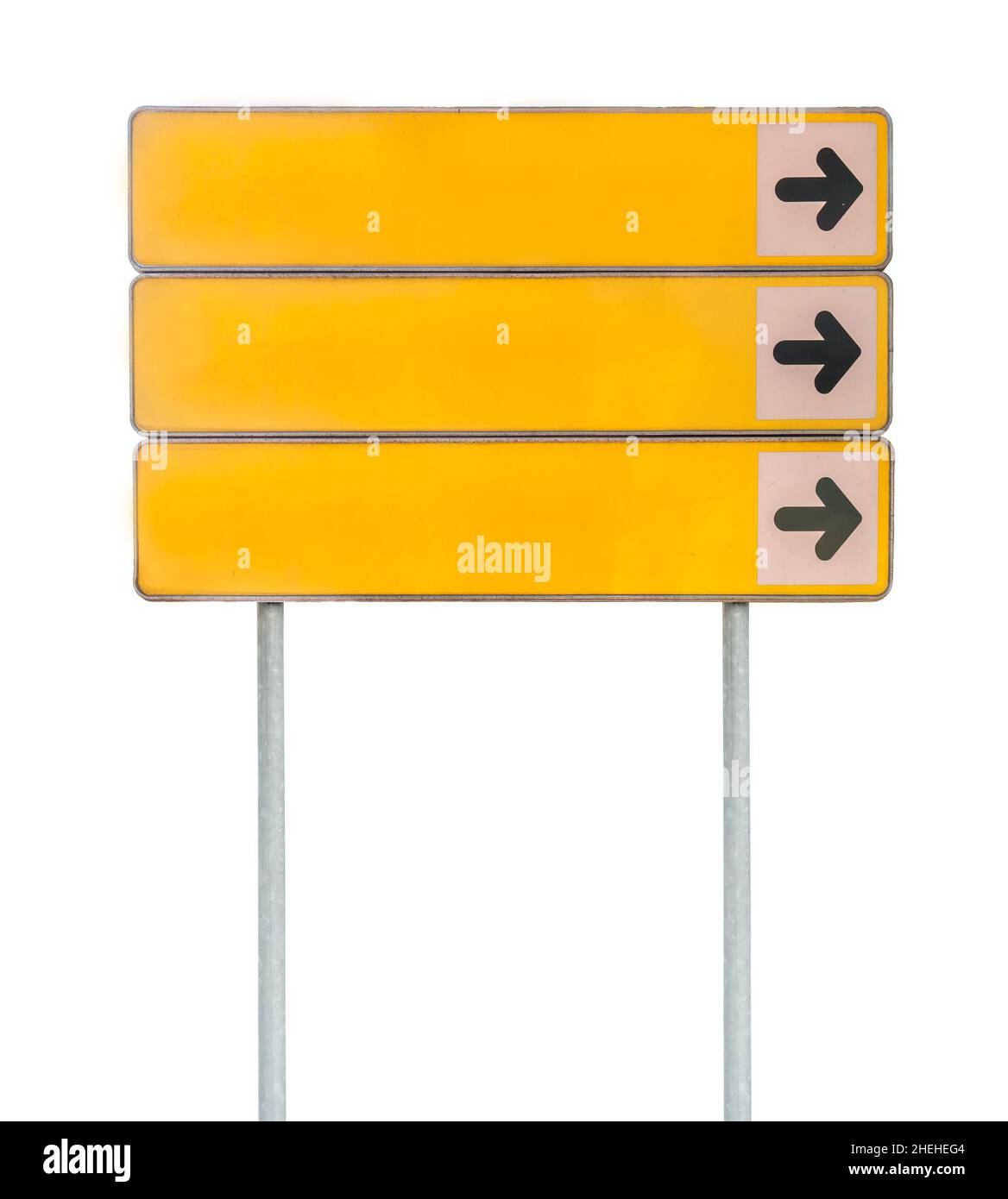Yellow directional arrow road sign Stock Photo - Alamy