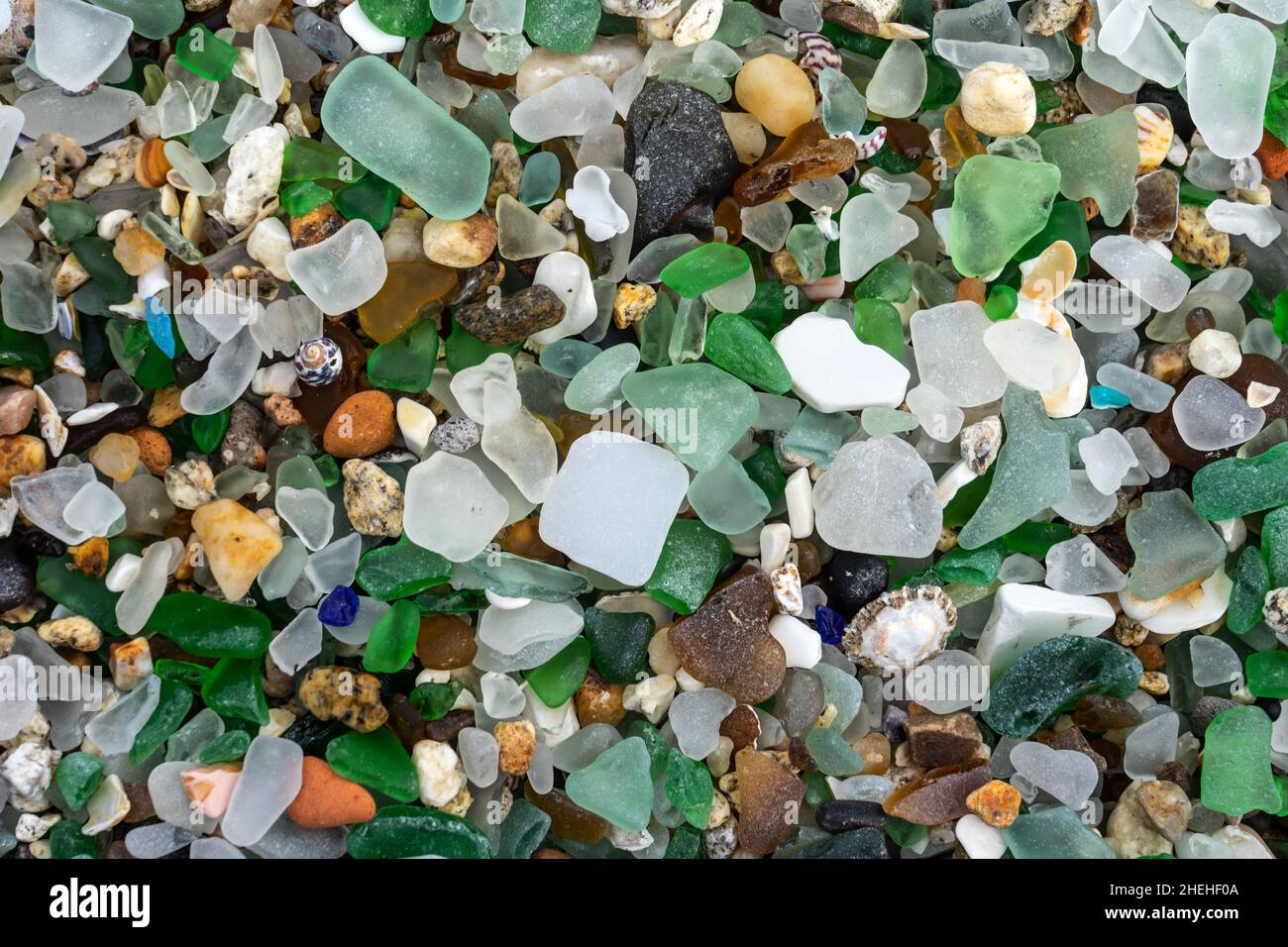 Colored crystals eroded by the sea in the beach of the crystals in the ...
