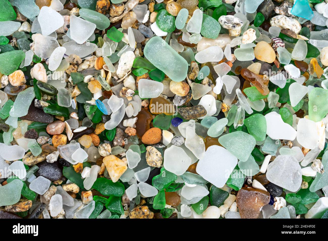 Colored crystals eroded by the sea in the beach of the crystals in the ...