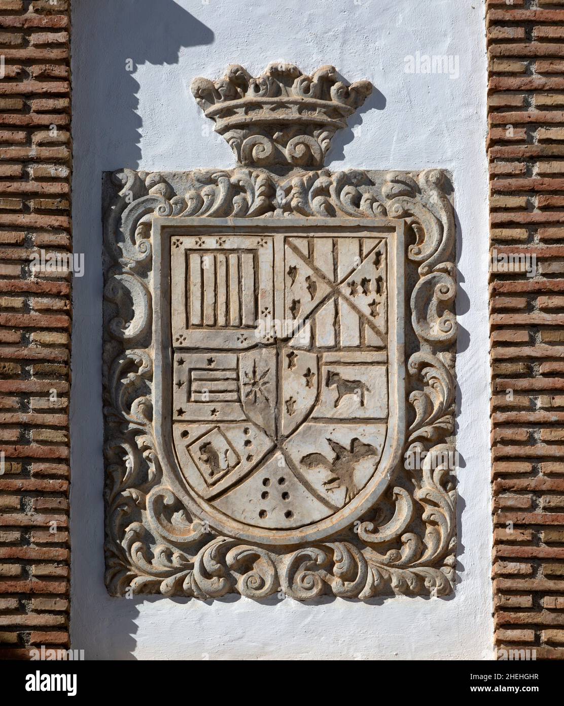 Stone heraldic family Coat of Arms on wall of building, Frigiliana ...