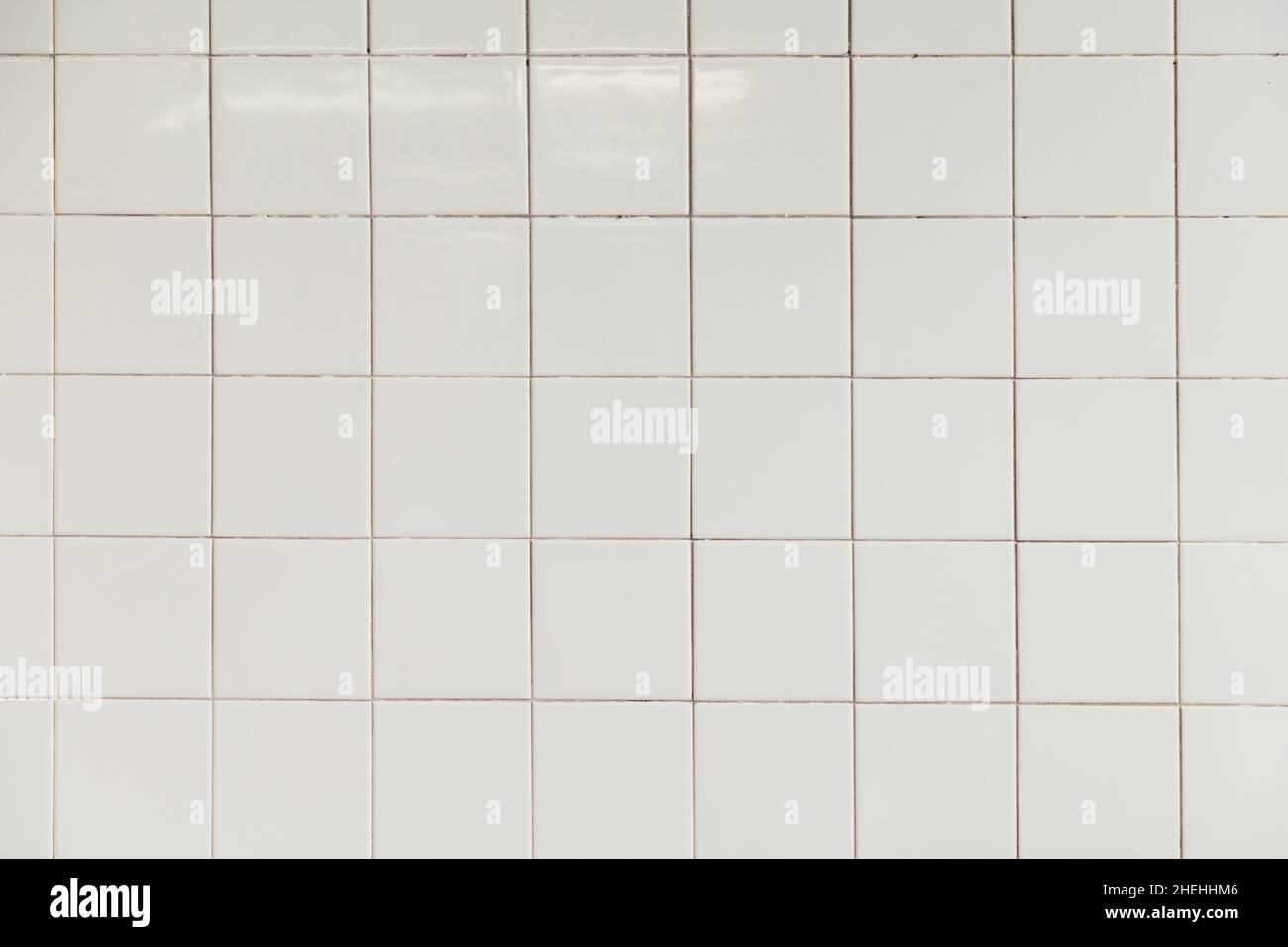 White old square ceramic glazed tiles texture Stock Photo - Alamy