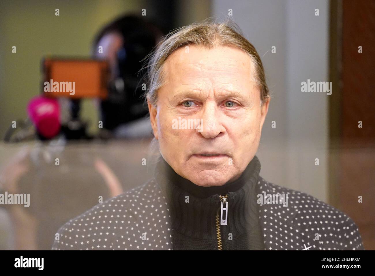 Hamburg, Germany. 11th Jan, 2022. The defendant Klaus Barkowsky goes to ...