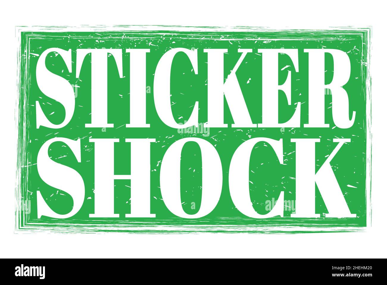 STICKER SHOCK, words written on green grungy stamp sign Stock Photo - Alamy
