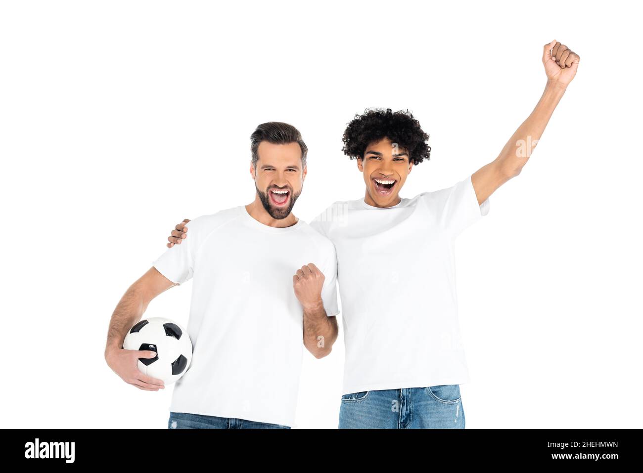 excited multiethnic sport fans with soccer ball screaming and showing ...