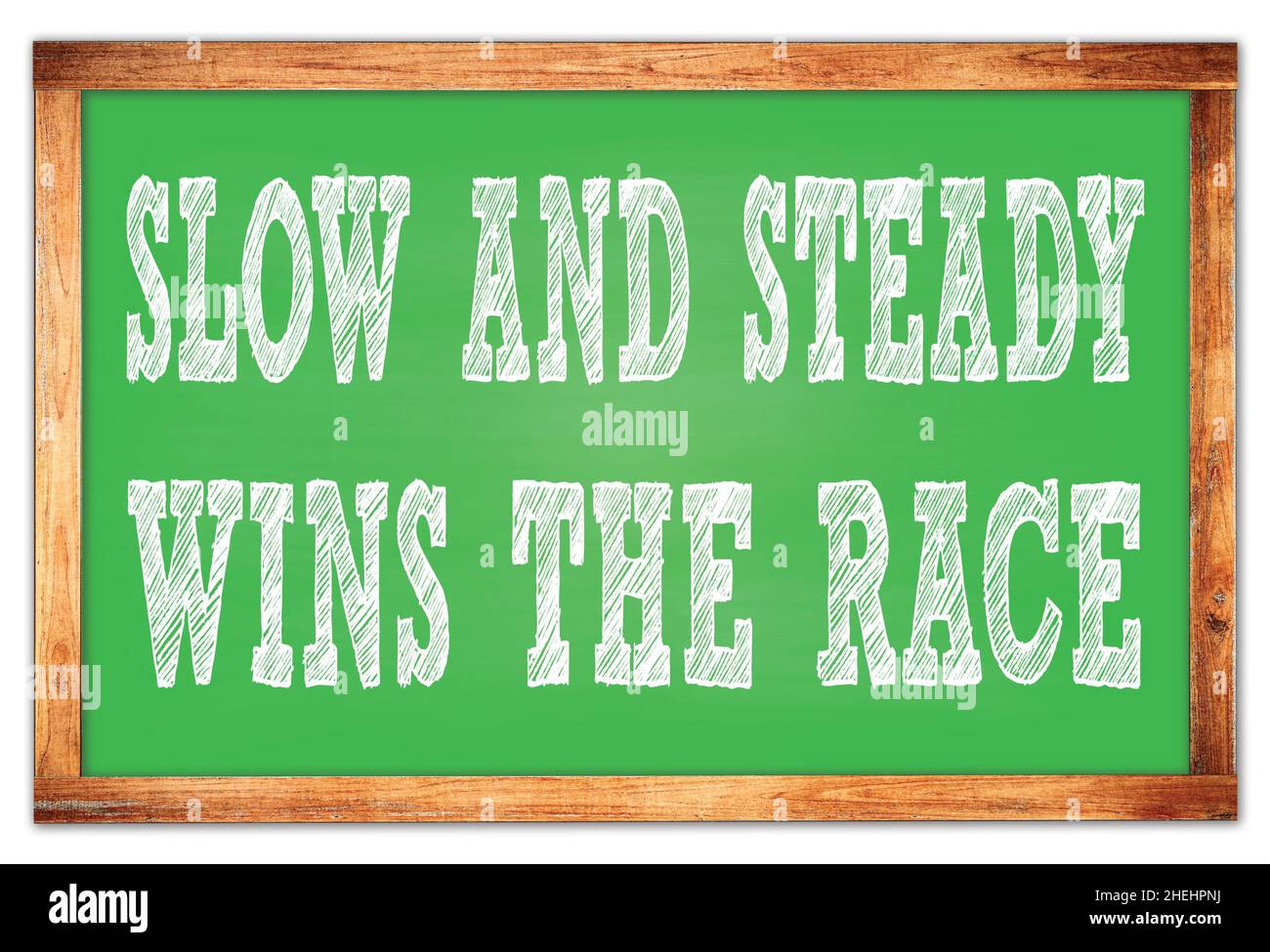 SLOW AND STEADY WINS THE RACE written on green wooden frame school ...
