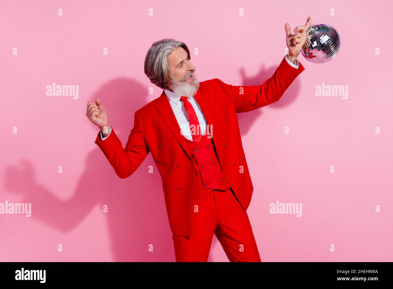Photo of funky pretty man pensioner dressed red jacket dancing holding ...