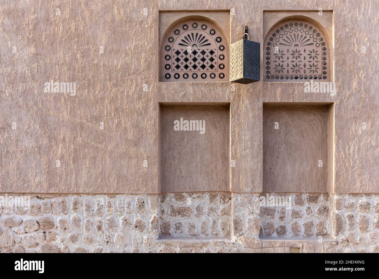 Arabic style window portals in stone wall with ornaments, traditional ...