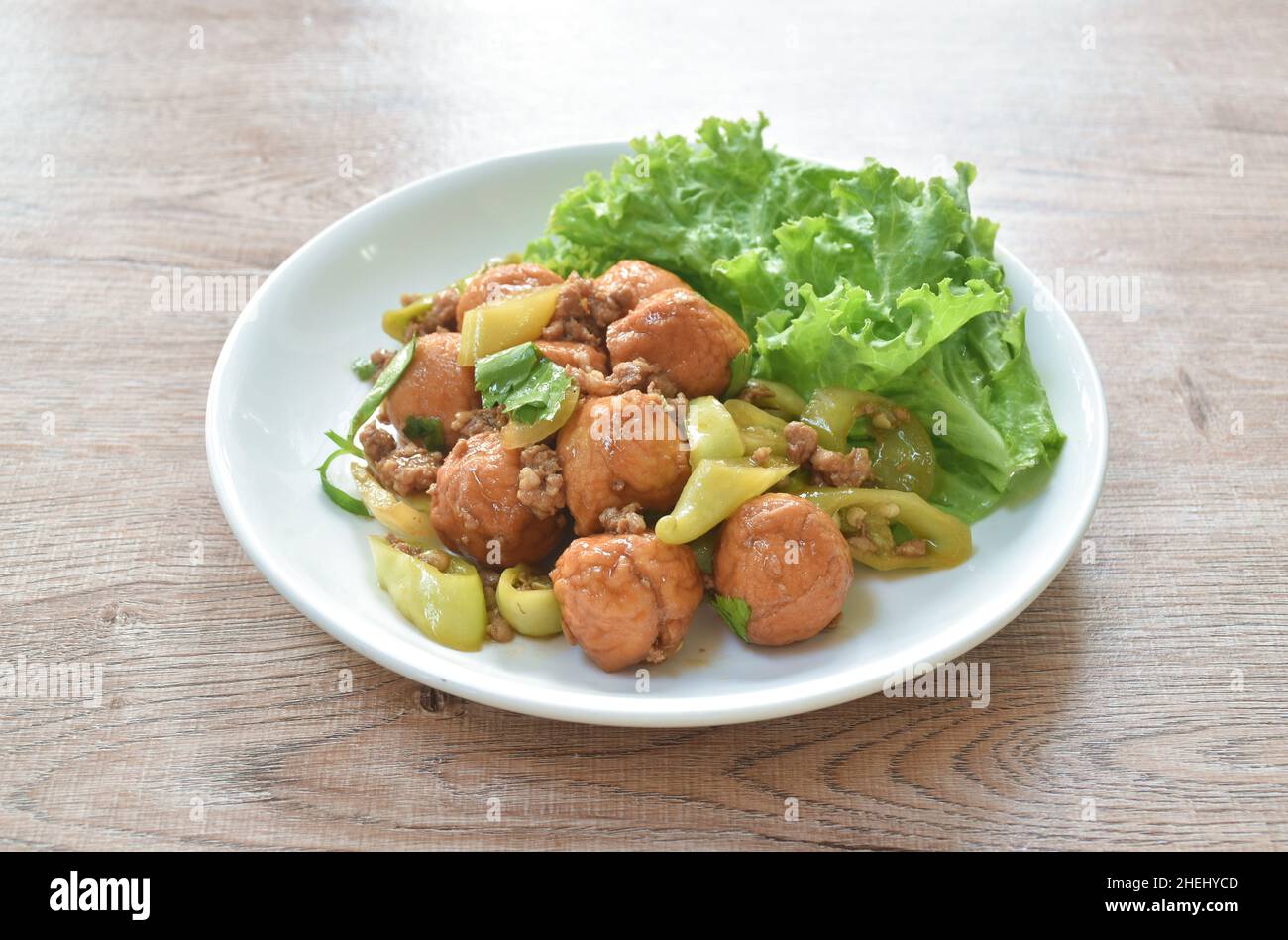 deep fried fish tofu ball with chop pork topping slice sweet green ...