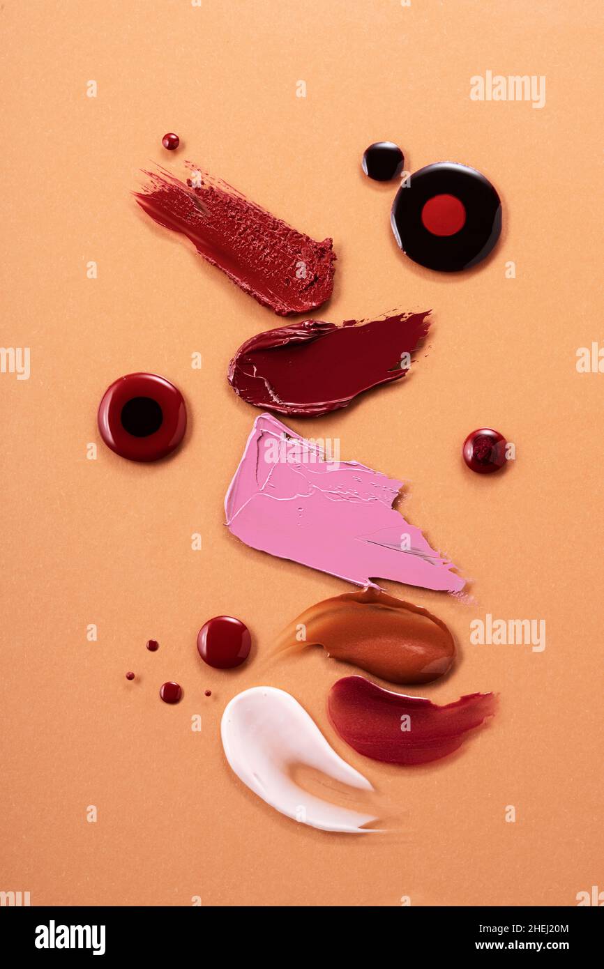 Smears of different colors are made with various cosmetic products. On ...