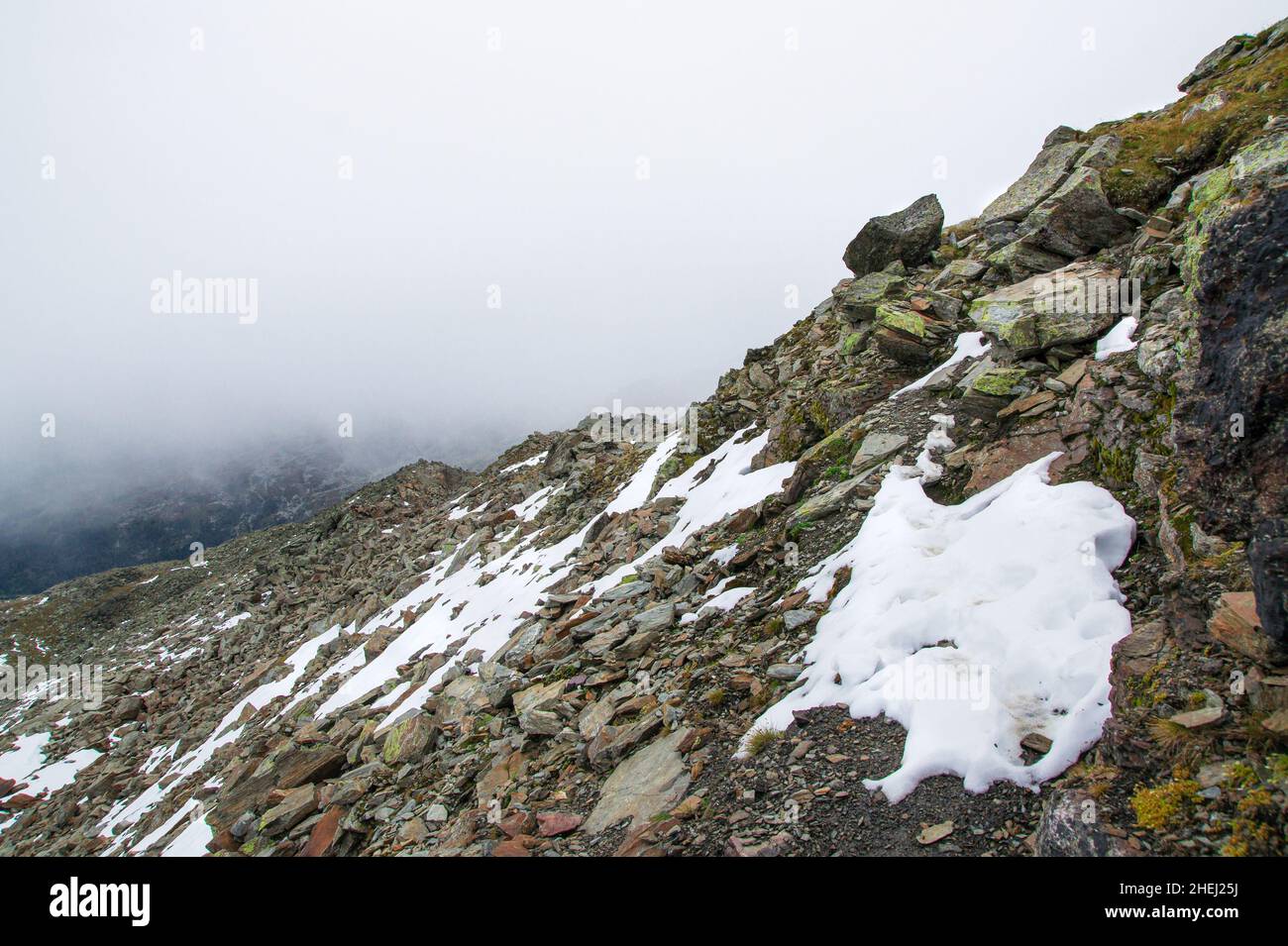 Alpine mountain path on a cloudy day in late summer Stock Photo - Alamy