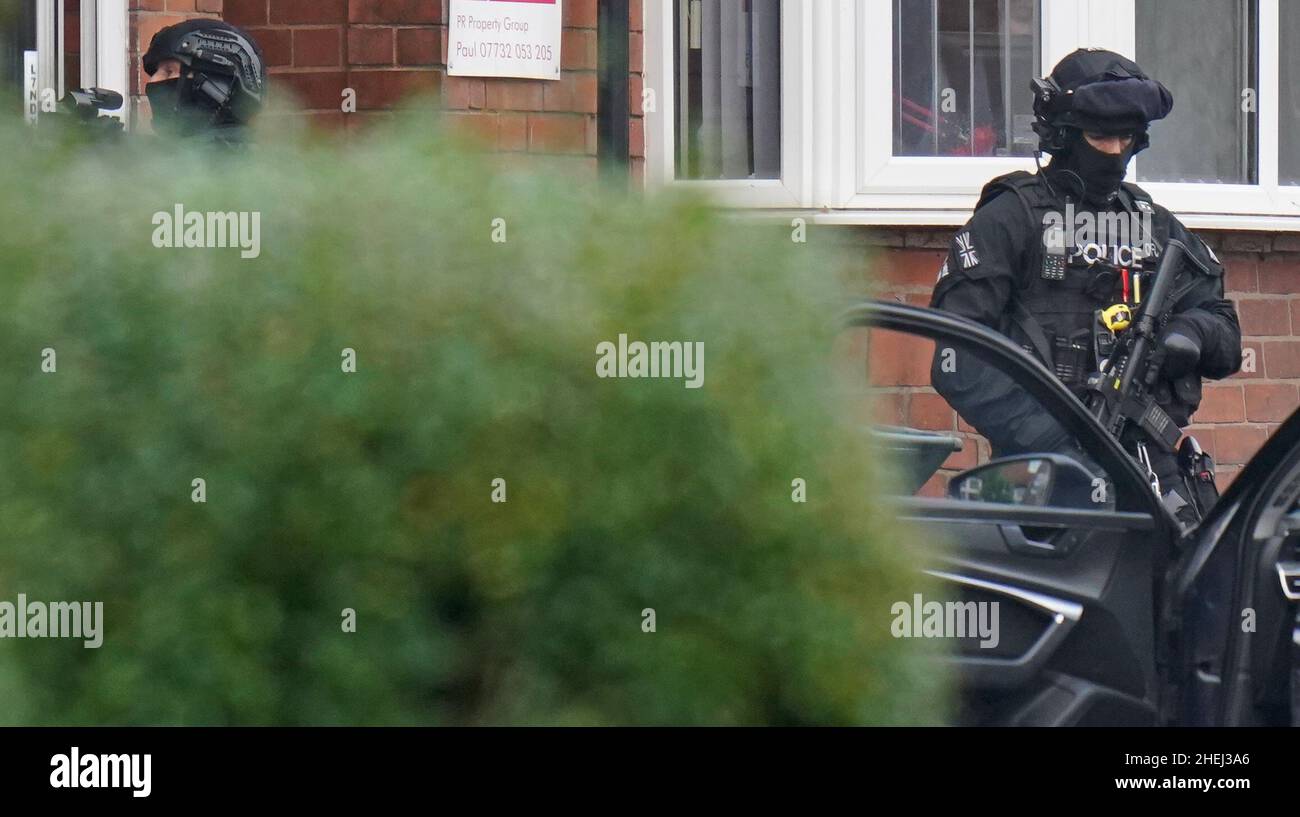 Armed police officers outside a property in Earlsdon Avenue North ...