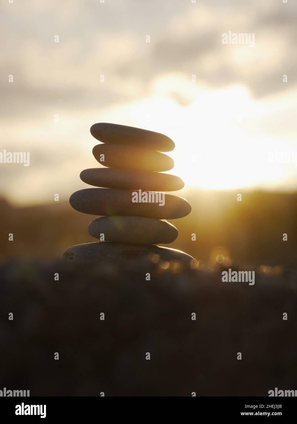 pepple balance beach Stock Photo - Alamy